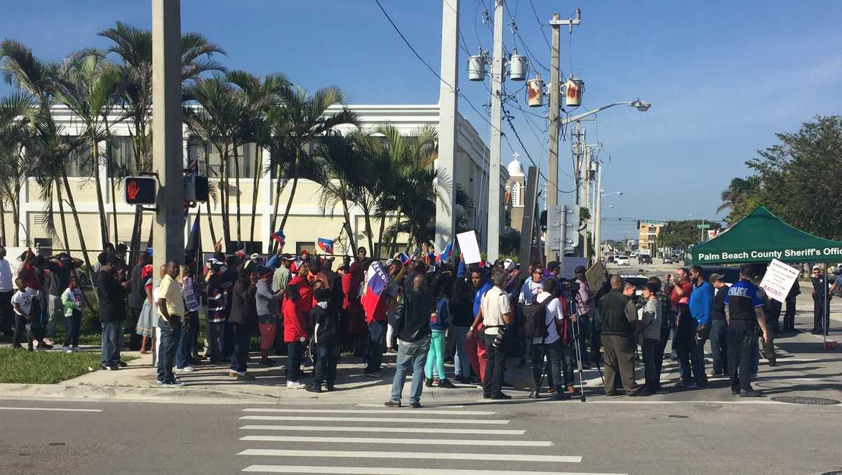 Hundreds show up for protest near Mar-A-Lago
