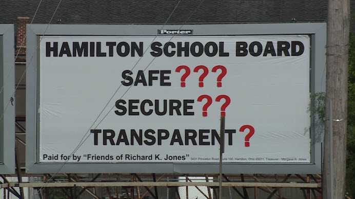Sheriff takes aim at Hamilton school board with new billboard