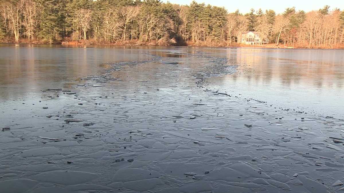 Firefighters rush into icy water after boat capsizes