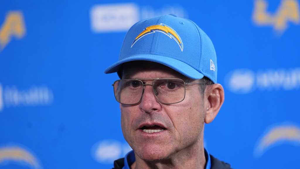 Jim Harbaugh misses part of Chargers' win for treatment of irregular ...