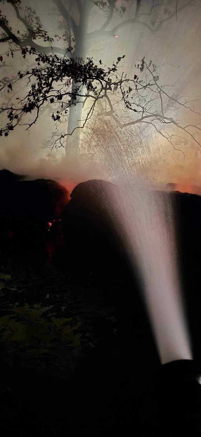 Firefighters work all night to put out large hay fire in St. Clair County
