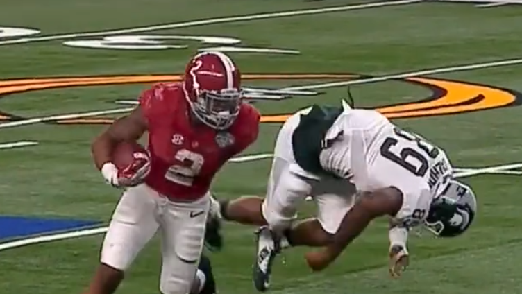 PHOTOS: Derrick Henry stiff-arms at Alabama