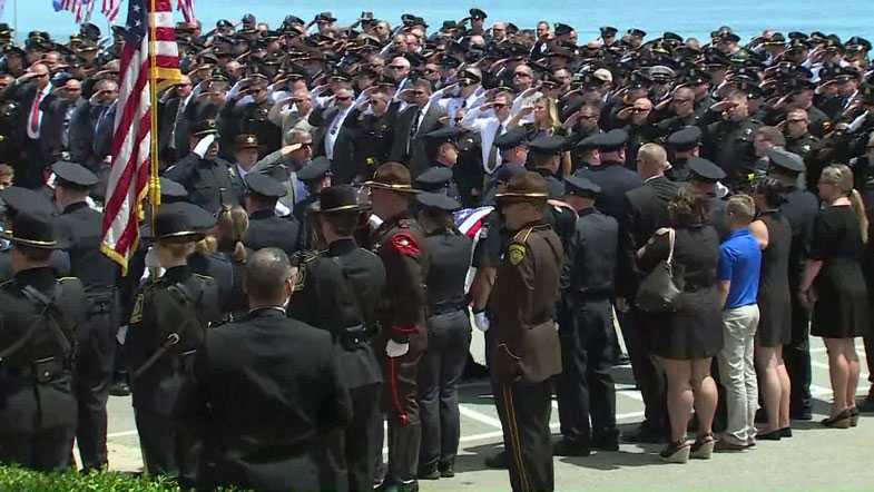 Funeral procession leads Racine Officer John Hetland to final resting place