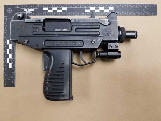 Police: Uzi found in secret compartment of Milwaukee man's car