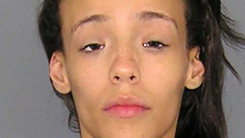 Woman accused of running over 3 with SUV