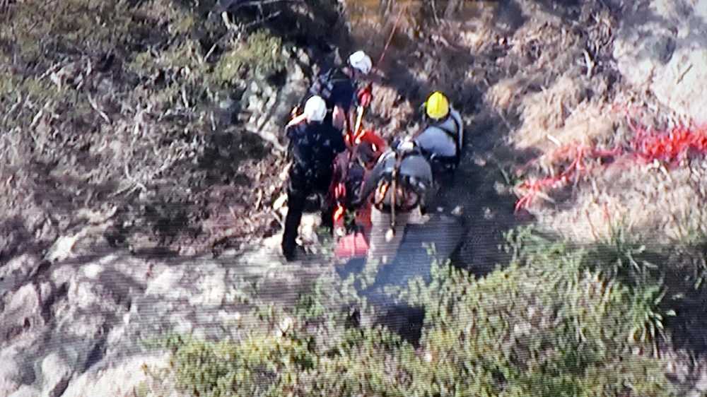Hiker rescued after fall on rock face of mountain