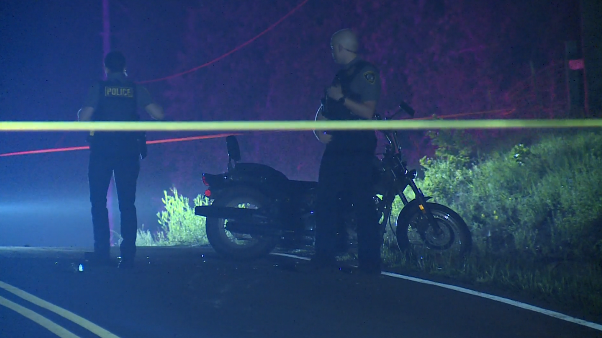One dead after crash involving motorcycle, truck hauling cattle