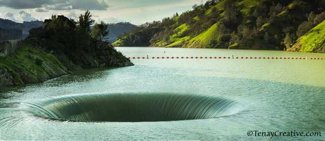 Lake Berryessa's Morning Glory Hole spills over, provides unexpected ...