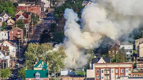 Crews battling 2-alarm fire in Homestead involving multiple buildings