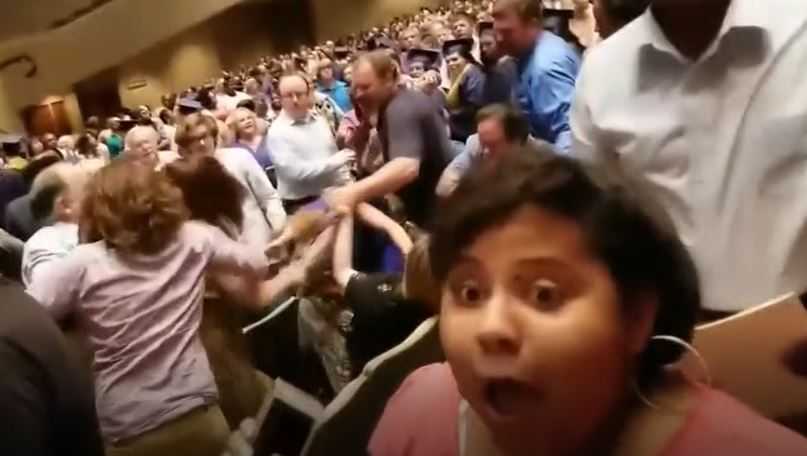 High school graduation features 'Pomp & Circumstance' and a grown-up brawl