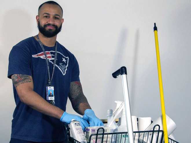 Mass. man graduates after working as night custodian to pay for ...