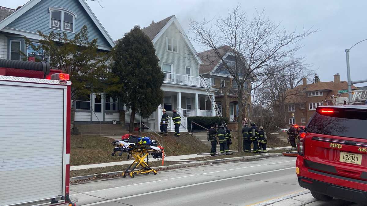 Milwaukee fire crews rescue three people trapped in house fire