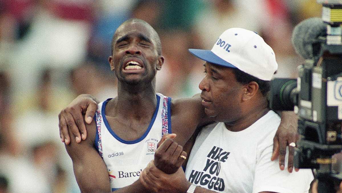 Jim Redmond, who helped his son Derek to the finish line in 1992 ...