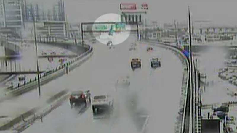 Video shows highway sign crashing down, hit by SUV on I-93