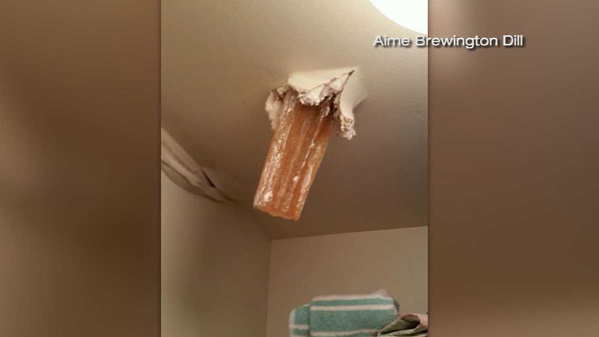 Giant icicle falls through woman's ceiling