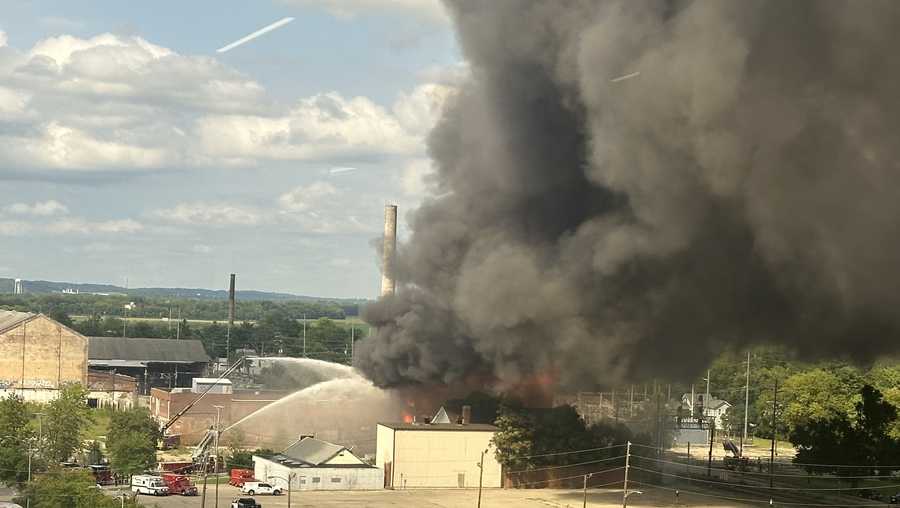 PHOTOS: Large fire burns at former paper company building in Hamilton