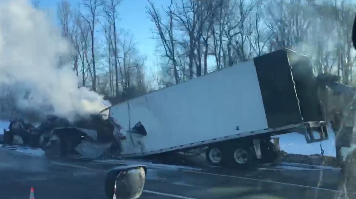 Semi trailer fire causing major backups along I-75 in Walton