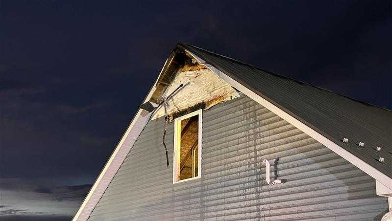 Severe thunderstorms cause lightning to strike house, causing fire