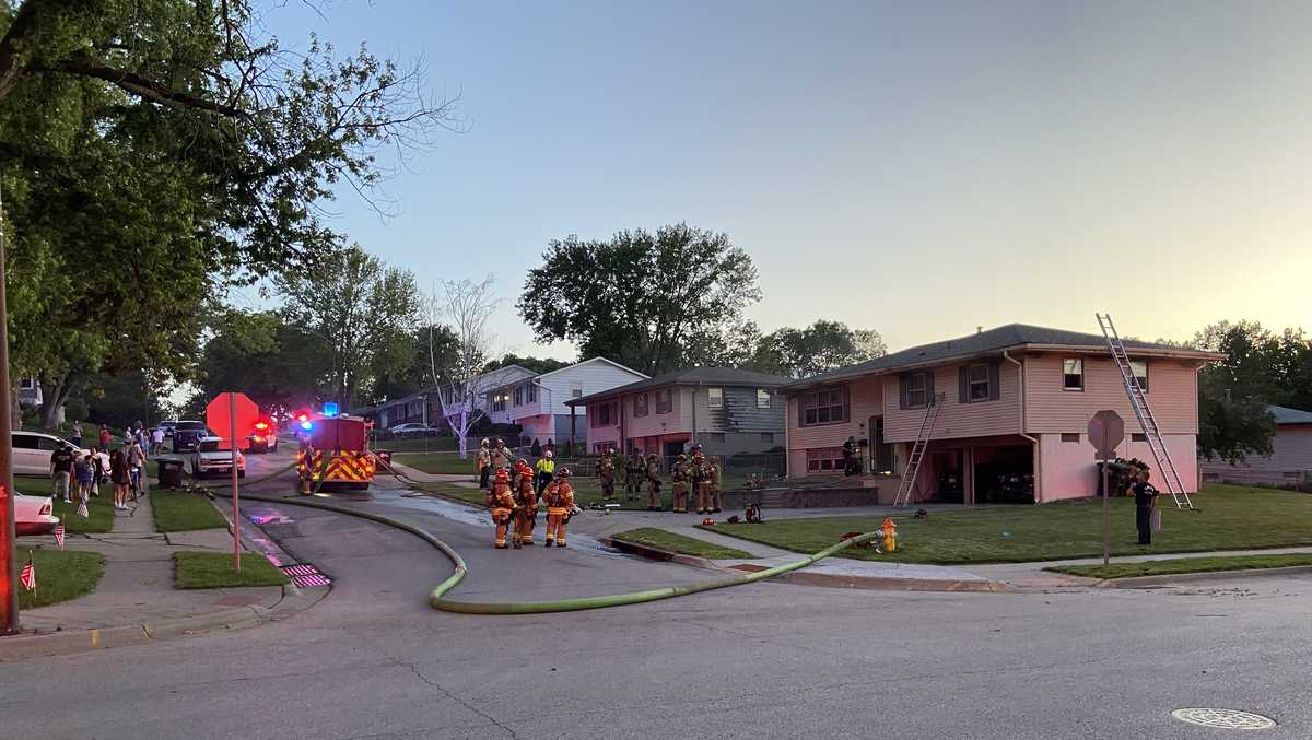 Omaha firefighter critically injured while battling house fire