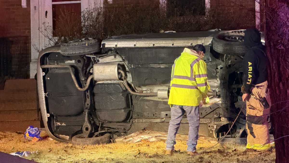 Vehicle damaged after rollover crash in Forest Hills