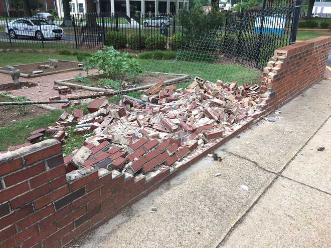 Driver injured in crash with brick wall