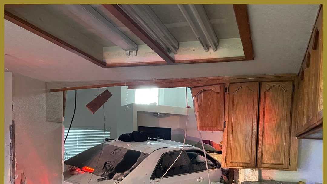 Man crashes car inside of home in Sacramento County