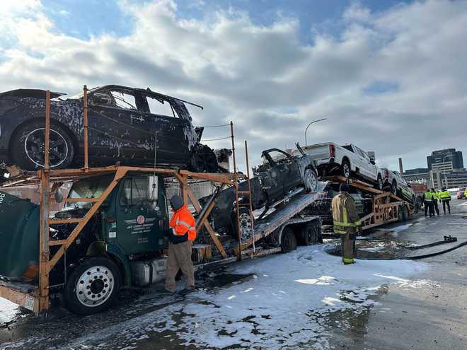 Car-carrying trailer catches fire on I-65 in Louisville