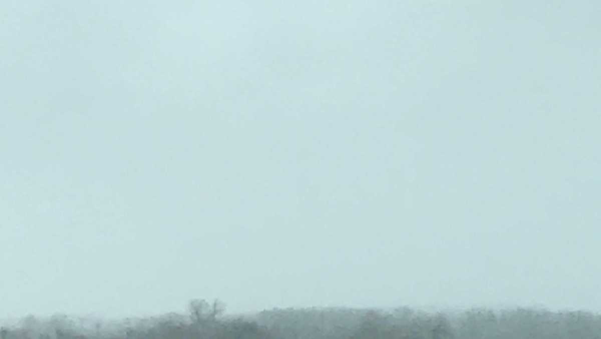 Flooding aftermath: damage to homes, roads