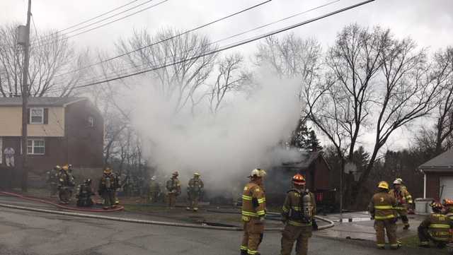 Firefighters battle flames at house fire in Penn Hills