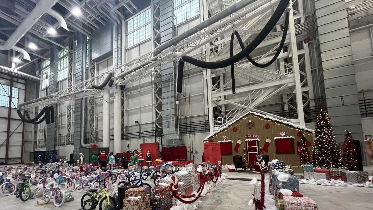 Dozens of angel tree children take a trip to North Pole, marking items ...