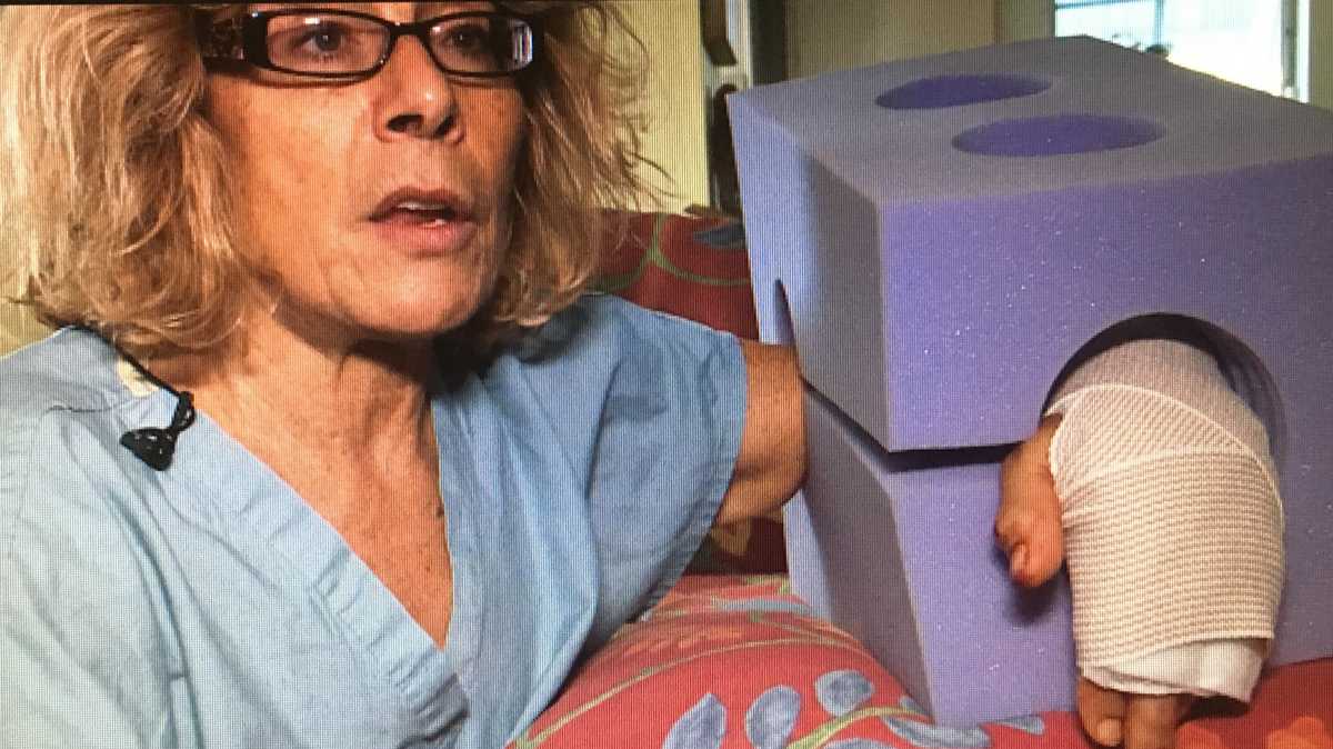 Shark bite almost takes woman’s hand