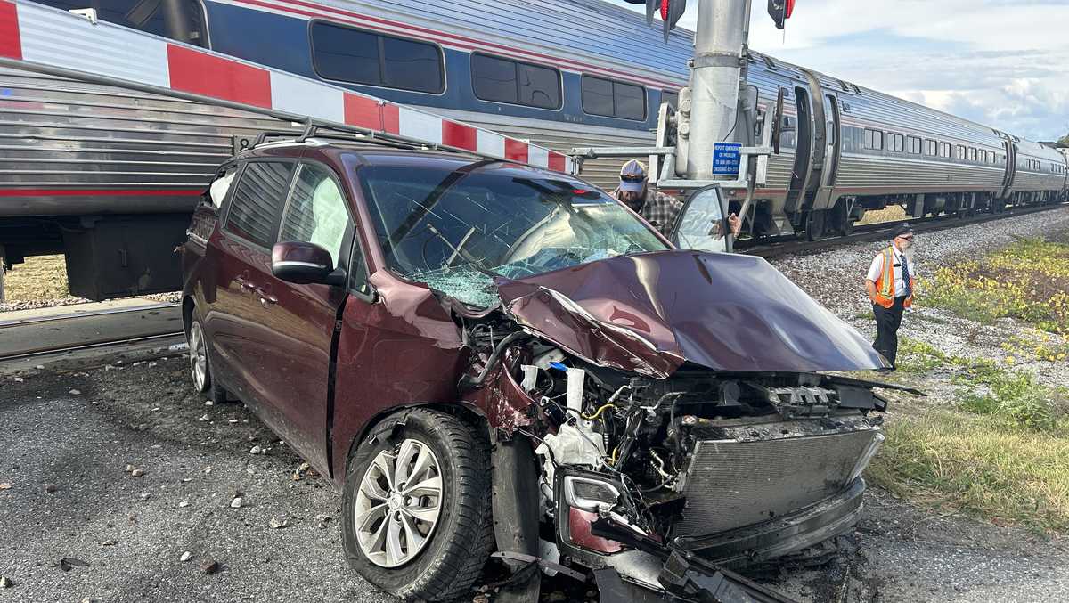 Driver fails to stop at railroad grade crossing, hits vehicle, Amtrak ...