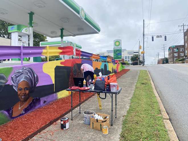 Local artist talks about community mural he's painting in Winston-Salem