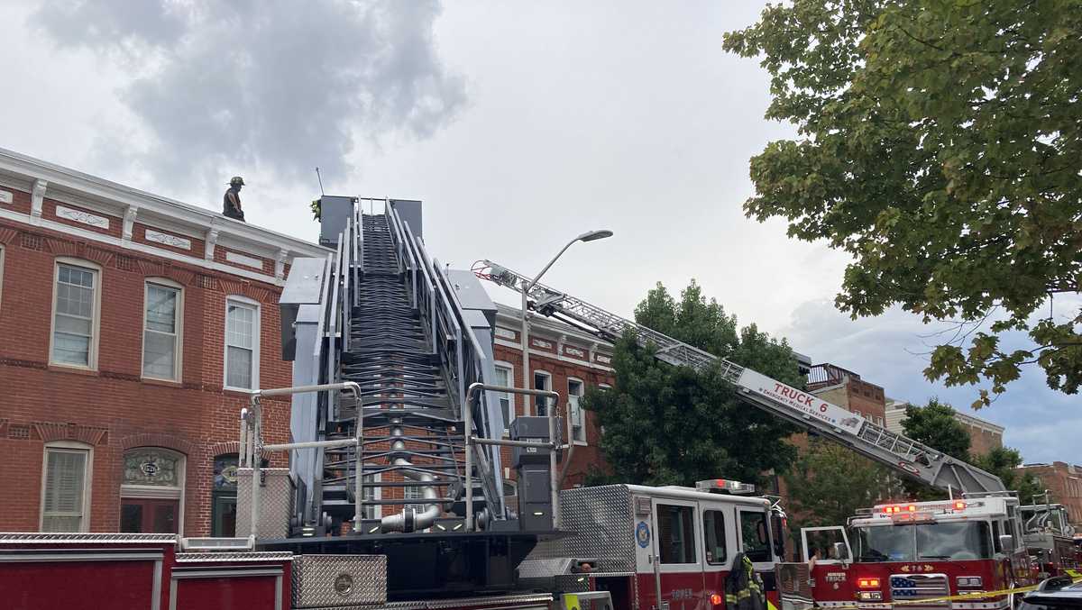 Crews battle rooftop fires in south Baltimore