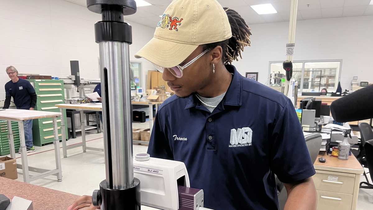 Students earn a degree while learning a trade.