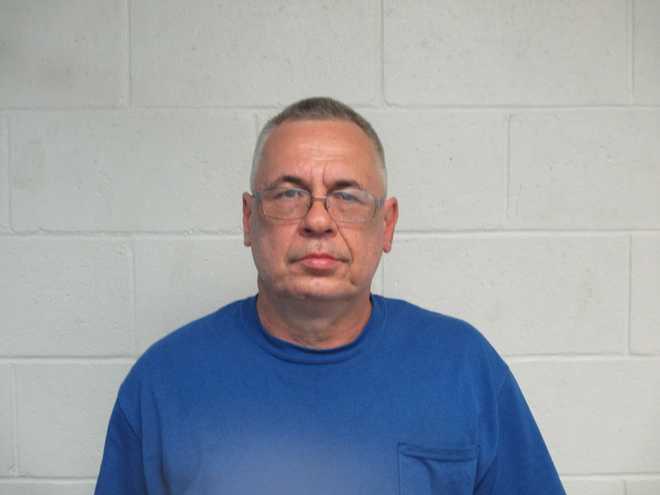 Police: Woman found with hypodermic needle in arm, man charged with ...