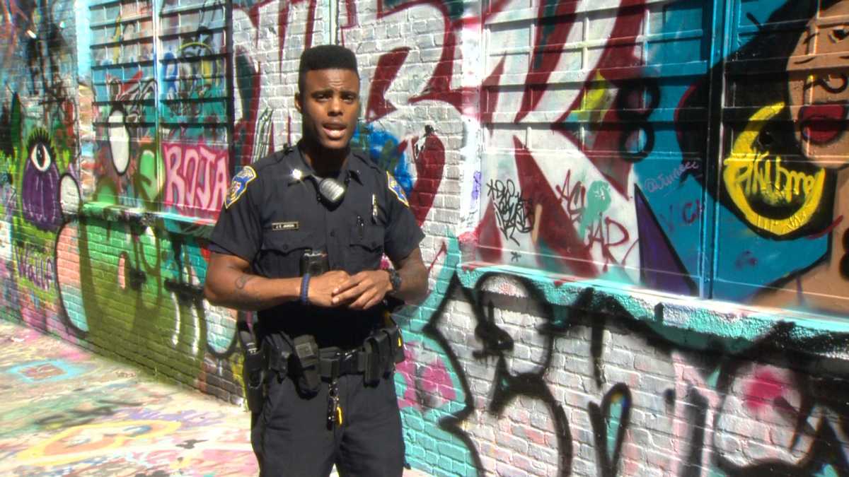 Baltimore police officer patrols by day, raps by night