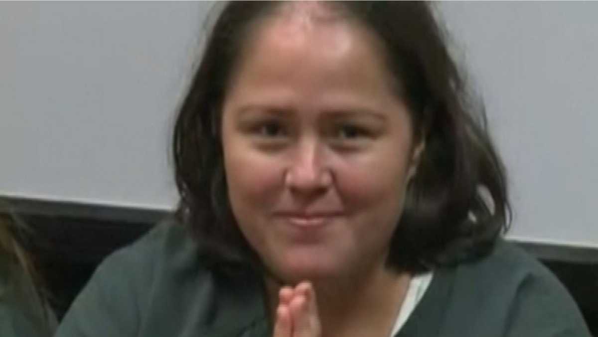 Mom accused of killing 4 children smiles, shows bizarre behavior during ...