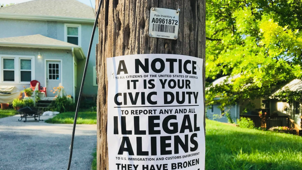 Signs urging Omaha residents to report 'illegal aliens' spotted in Dundee