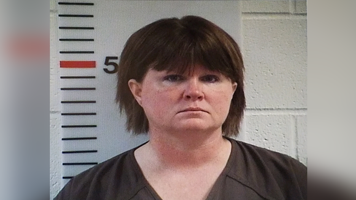 Former Pocola HS teacher accused of raping students turns herself in