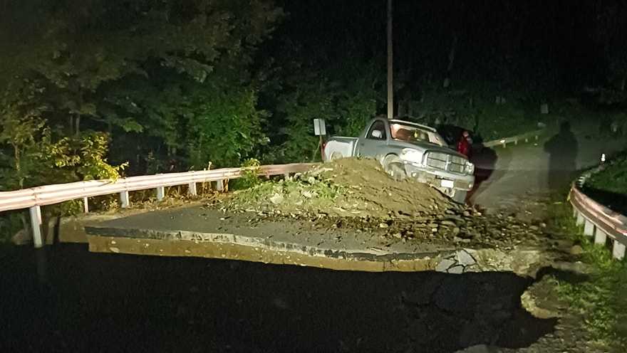 Truck nearly ends up in massive washout in Jay, again