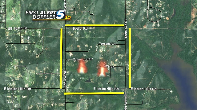 Large wildfire prompts evacuations in Norman