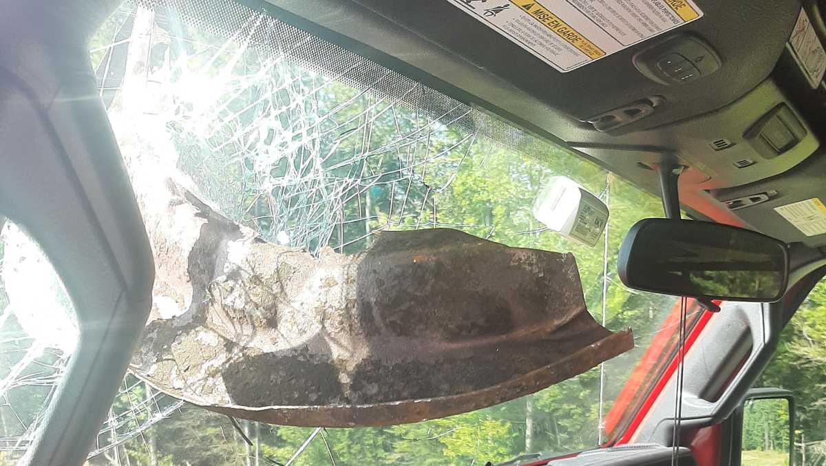 Metal debris strikes windshield inches from NH woman's face in Maine