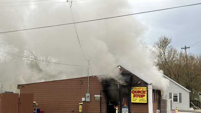 Crews battle fire at convenience store in Miami Township