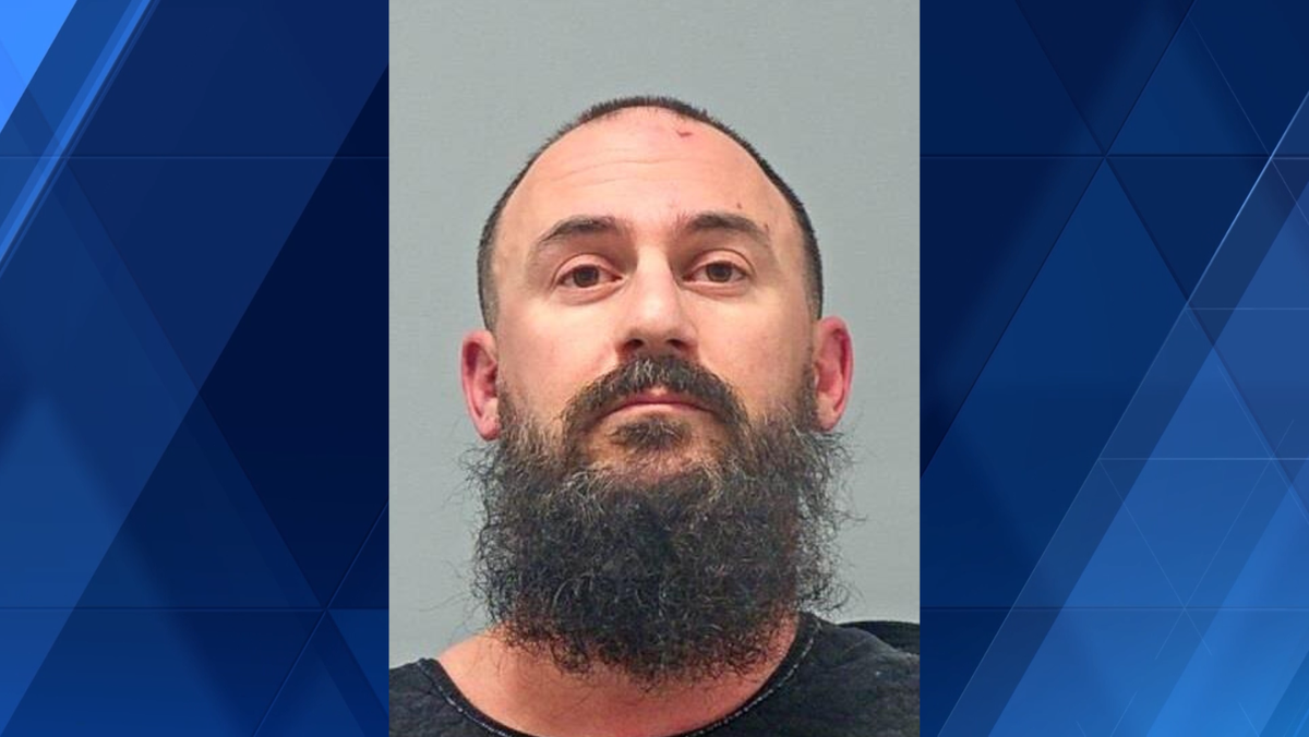 Police: Man accused in wife's death turns himself in at Ohio police station