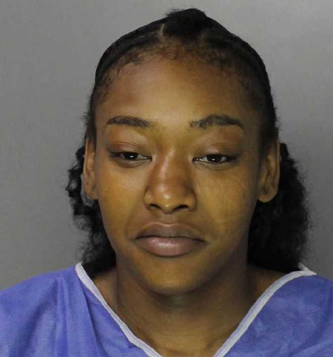 Harrisburg woman accused of attacking elderly woman with golf club