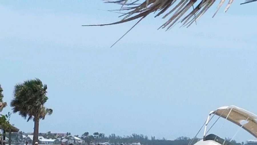 Heavy winds and rough seas cause several boats to wash up on the rocks