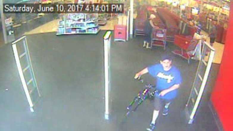 Surveillance video: Man walks out of Target with stolen bike