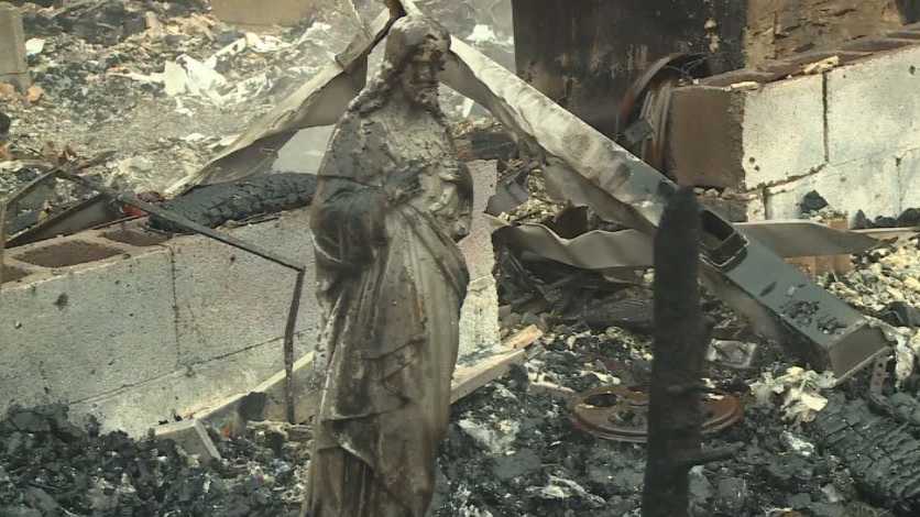 Statue of Jesus still standing after Tennessee wildfire destroys home