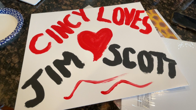 Woman plans to honor Reds Opening Day parade grand marshal with signs ...